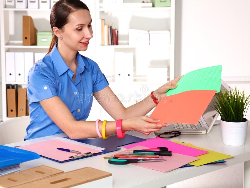 Girl Designer in an Office Behind a Table Stock Image - Image of adult ...