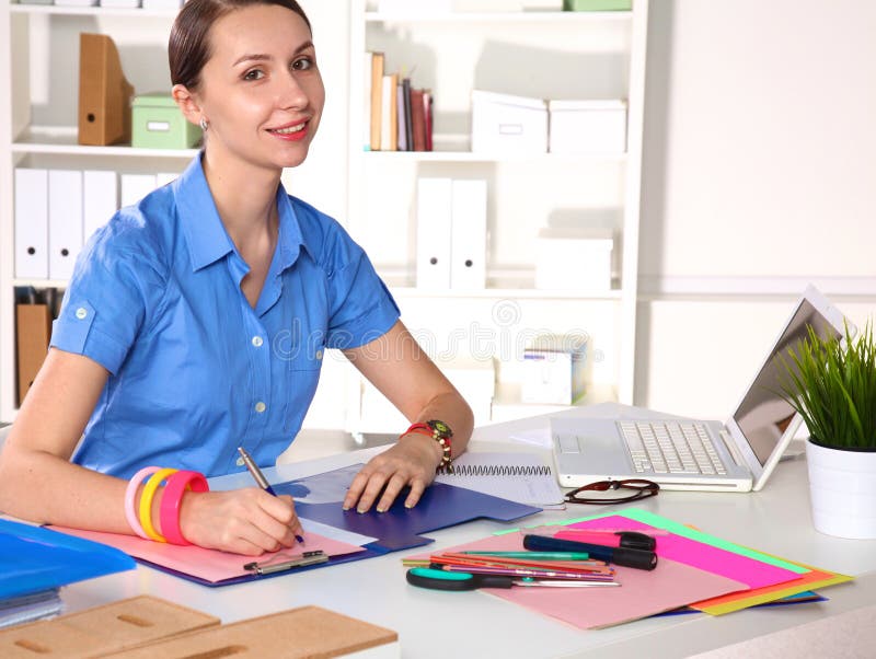 Girl Designer in an Office Behind a Table Stock Image - Image of desk ...