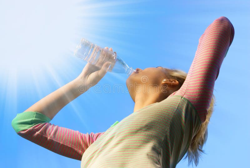 Girl dinking water stock image. Image of blue, gulp, lifestyle - 2608025
