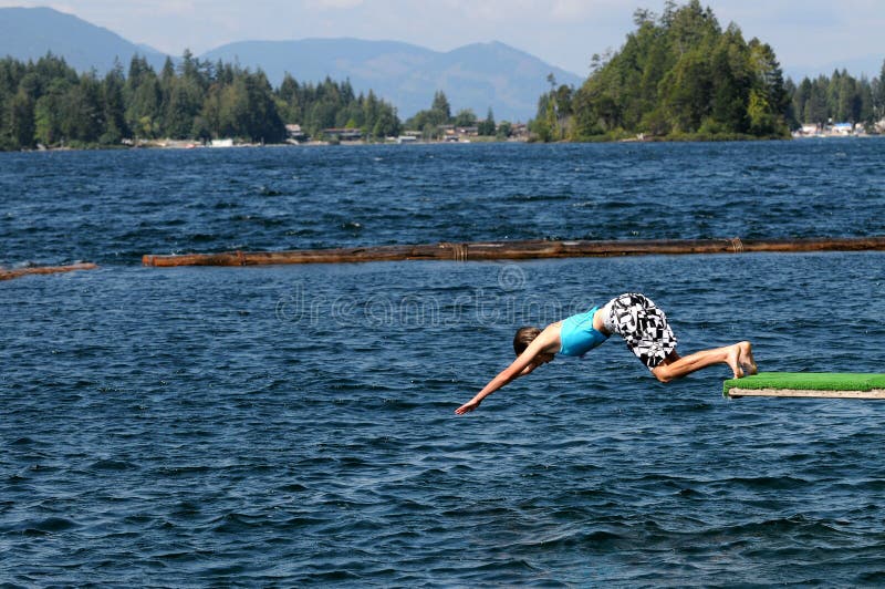 Girl diving into lake stock photo. Image of healthy, resort - 11149062
