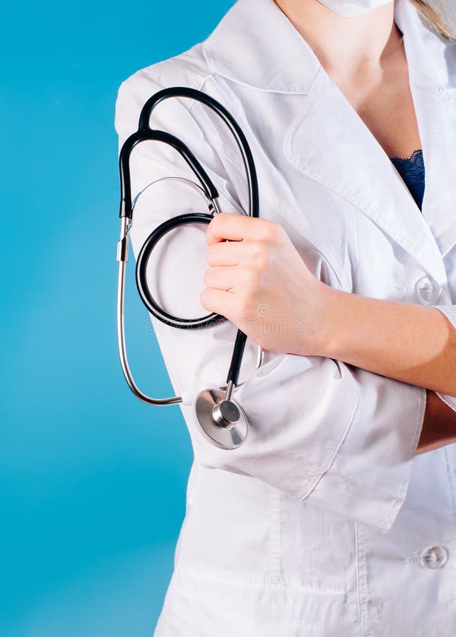 Doctor Cardiologist With Stethoscope In Hand Health Concept Girl Doctor