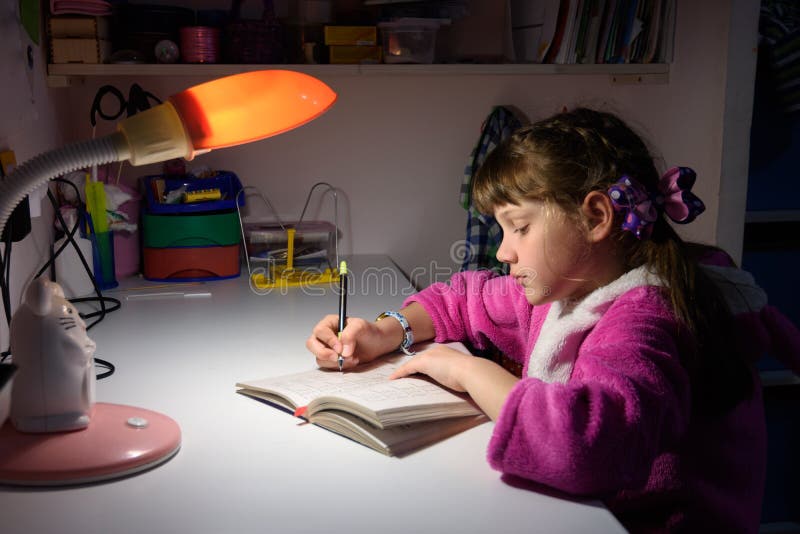 A Girl Does Homework Late at Night Stock Image - Image of lesson ...
