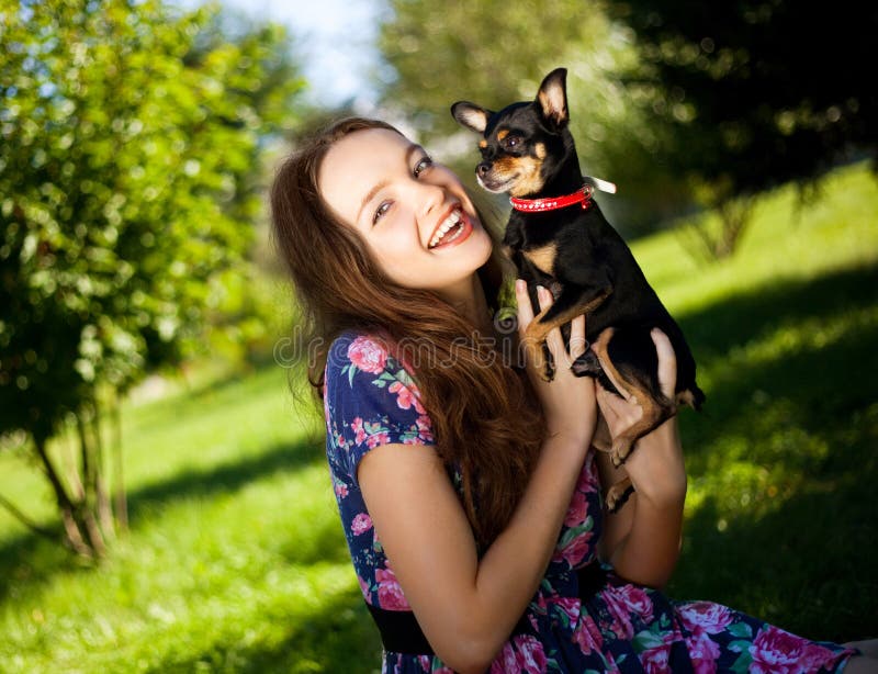 Girl with a dog stock photo. Image of carefree, hold - 16190550