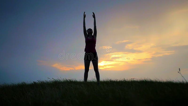 Girl Doing Exercise in Sport at Sunset Background Stock Footage - Video ...