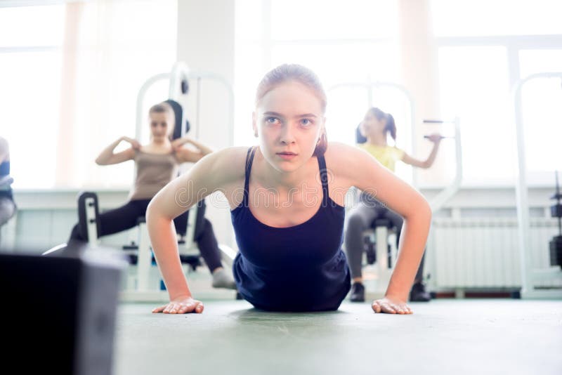 Girl Doing Exercises in Gym Stock Photo - Image of physical, sportive ...