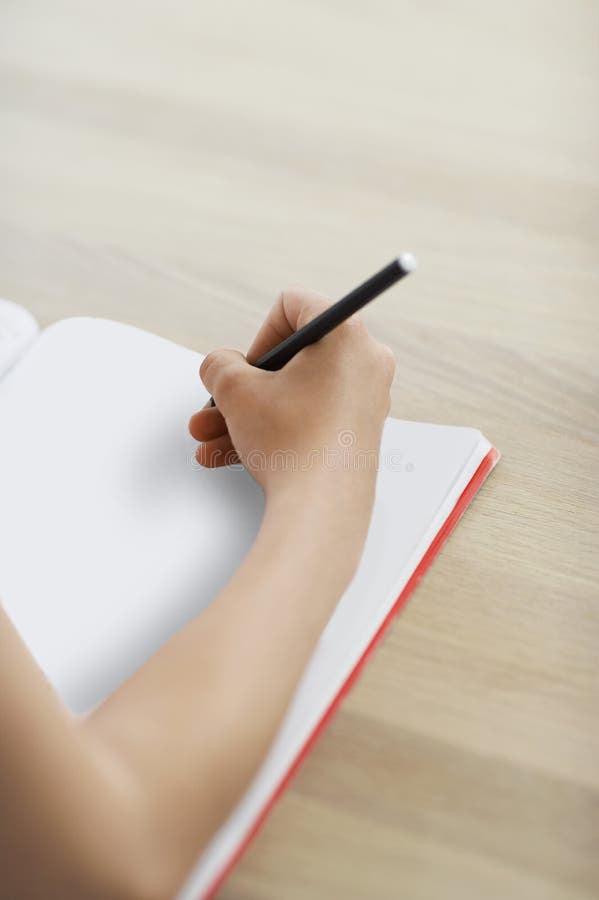 Girl Doing Geometry Homework on Table Close Up of Hand Stock Image ...