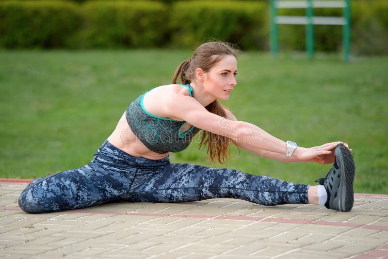 Girl Doing Hamstring Leg Stretching Exercise and Stretches Stock Image ...