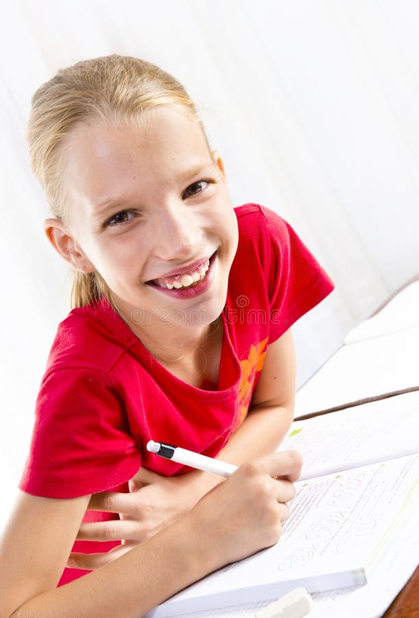 Girl doing her homework stock image. Image of concept - 26773805