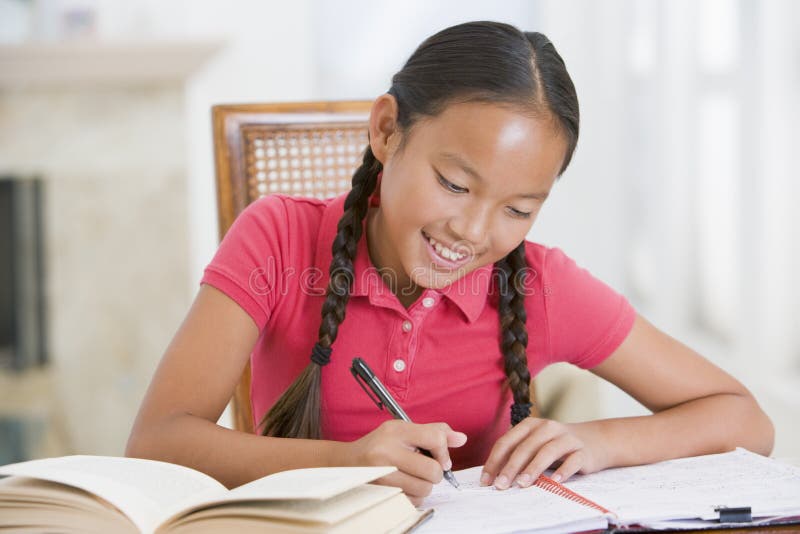 Girl Doing Her Homework stock photo. Image of adolescent - 6441826