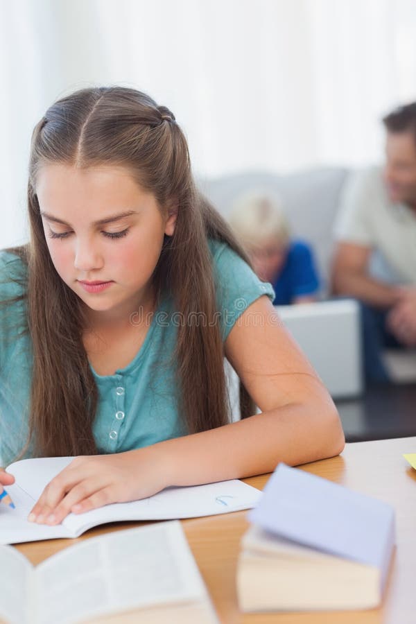 Girl doing her homework stock photo. Image of long, literary - 31802392