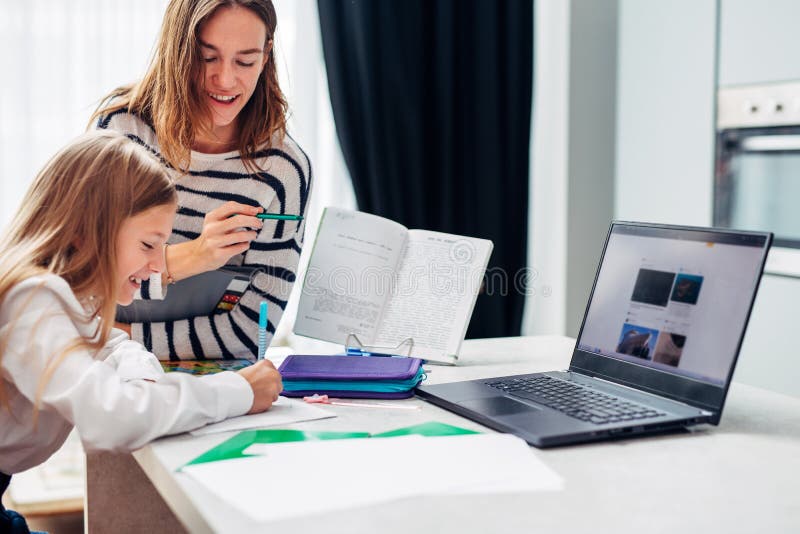 Girl is Doing Her Homework and Her Mother is Checking Stock Image ...