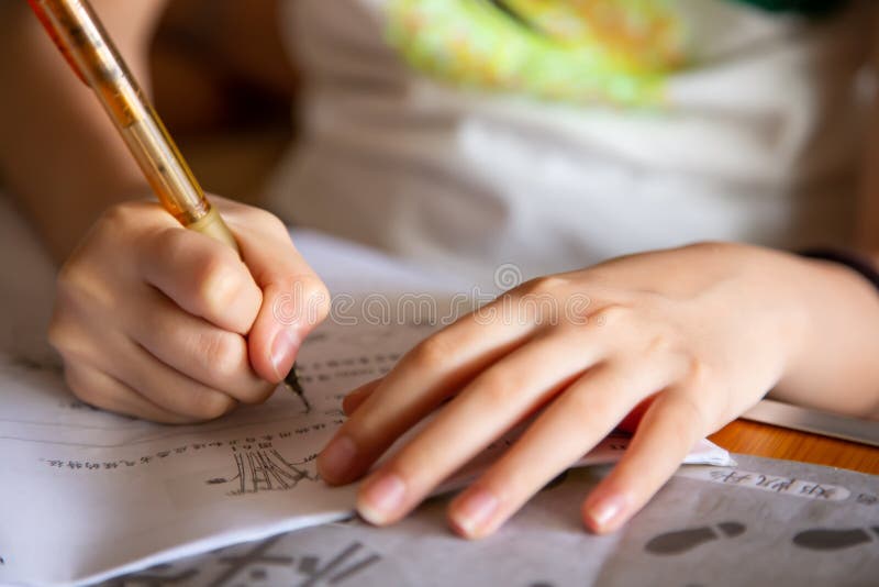 Girl doing her school work stock image. Image of lesson - 181008973