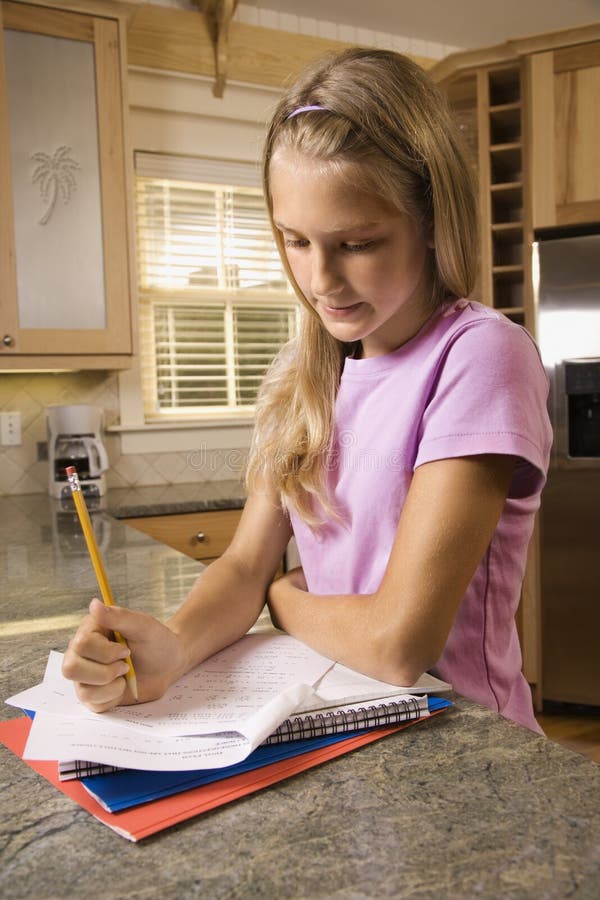 Girl doing homework. stock photo. Image of full, space - 3421556