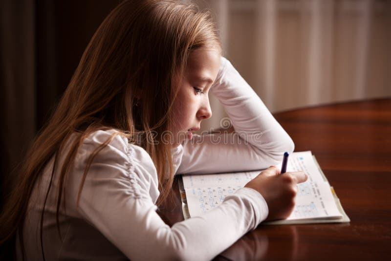 Girl Doing Homework stock photo. Image of education, child - 62215974