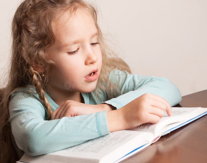 Sad girl doing homework stock image. Image of school - 34383011