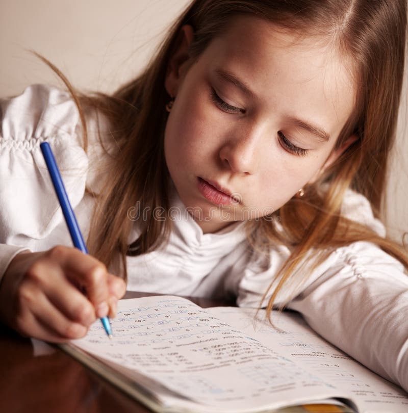 Girl doing homework stock photo. Image of descent, expressing - 31467456