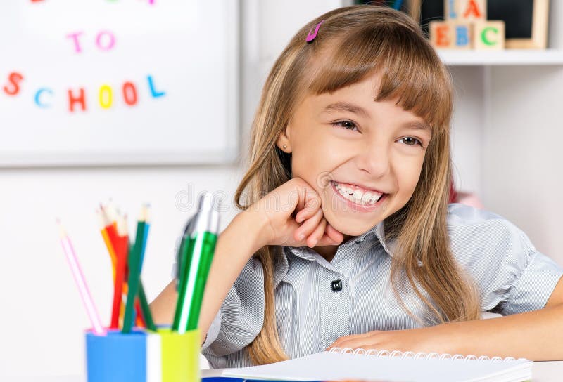 Girl doing homework stock photo. Image of cheerful, funky - 44753256
