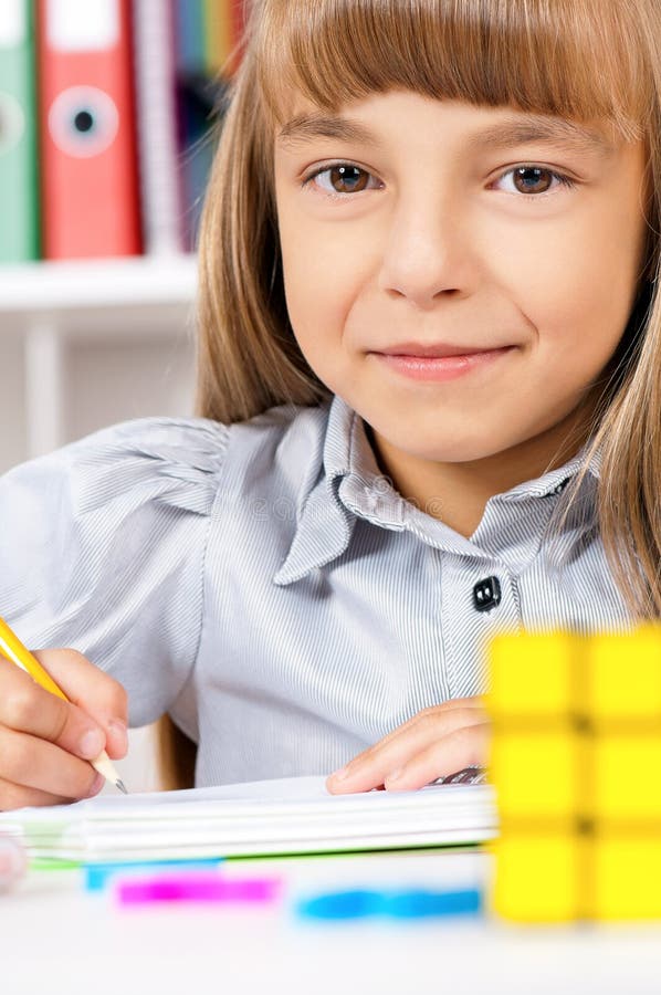 Girl doing homework stock image. Image of human, female - 44753303