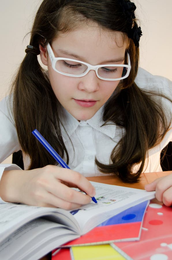 Girl doing homework stock photo. Image of concentration - 30376538