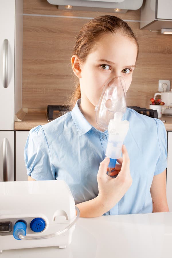 Girl doing inhalation stock photo. Image of asthma, respiration - 64070670