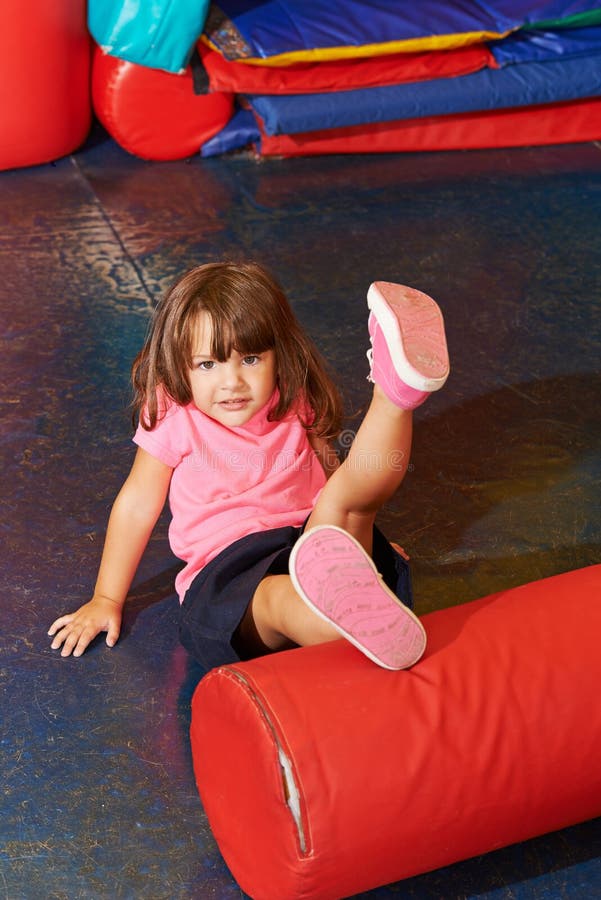 Girl Doing Kids Gymnastics In Gym Stock Photo - Image: 61671391