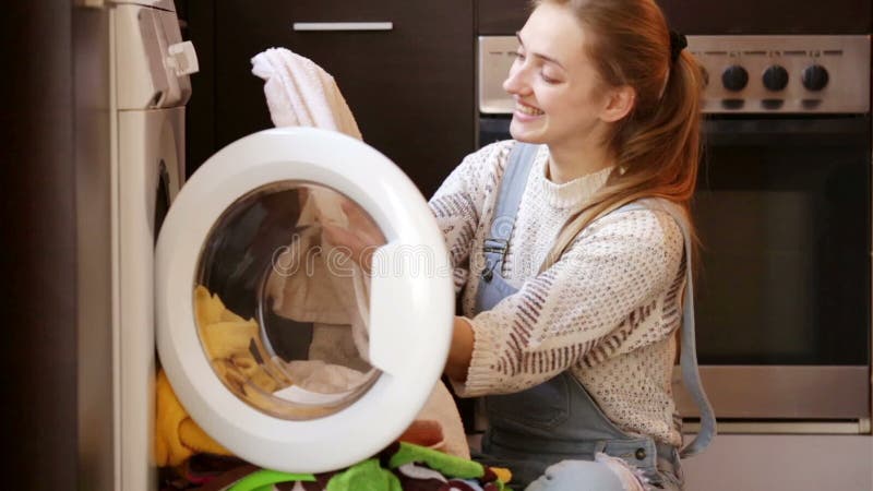 Girl doing laundry stock video. Video of happy, adult - 73579767