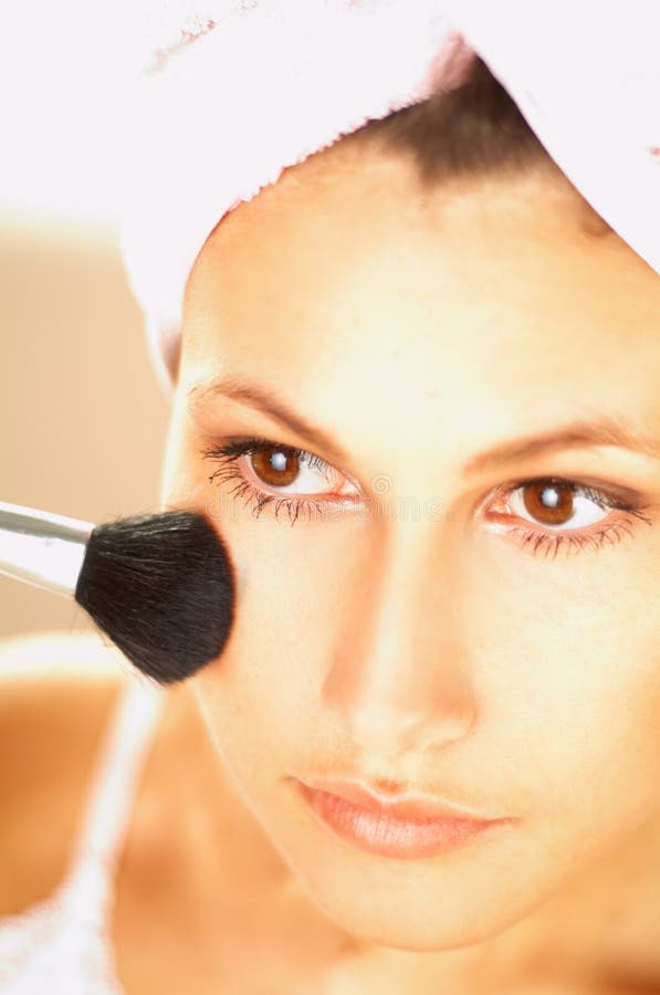 Girl doing makeup stock image. Image of defocus, morning - 569523