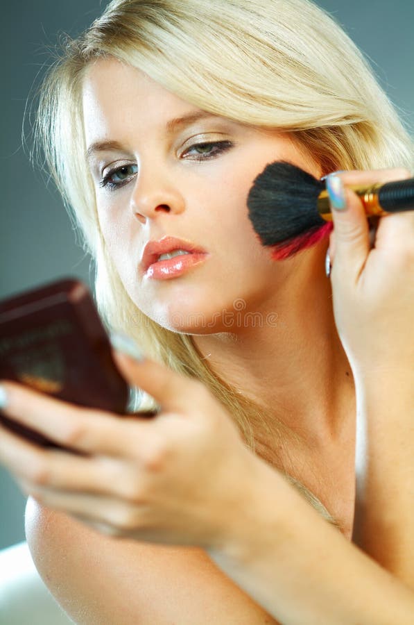 Girl doing makeup stock image. Image of lips, body, gorgeous - 598575