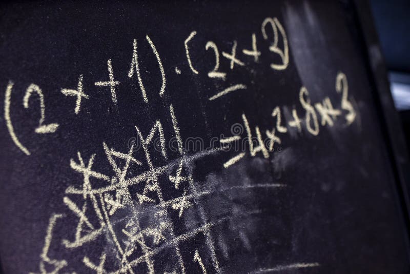 Girl Doing Math with Chalk on Blackboard. Stock Image - Image of ...