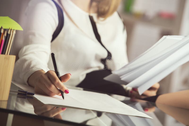 Girl doing paperwork stock photo. Image of paperwork - 90121236