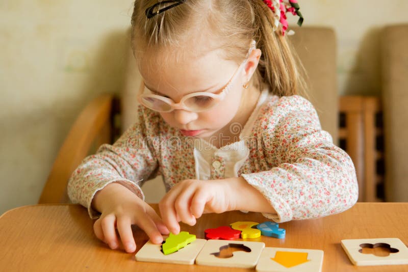 A Girl with Down Syndrome Develops Fine Motor Skills. Self-service ... A Girl with Down Syndrome Develops Fine Motor Skills. Self-service ...