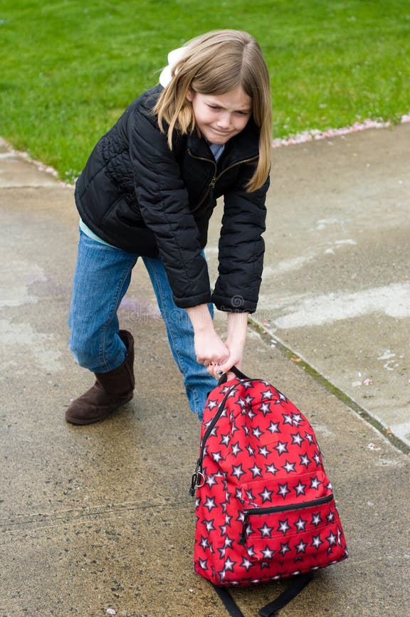 Girl Dragging Heavy Backpack Stock Photo - Image of child, female: 19661424