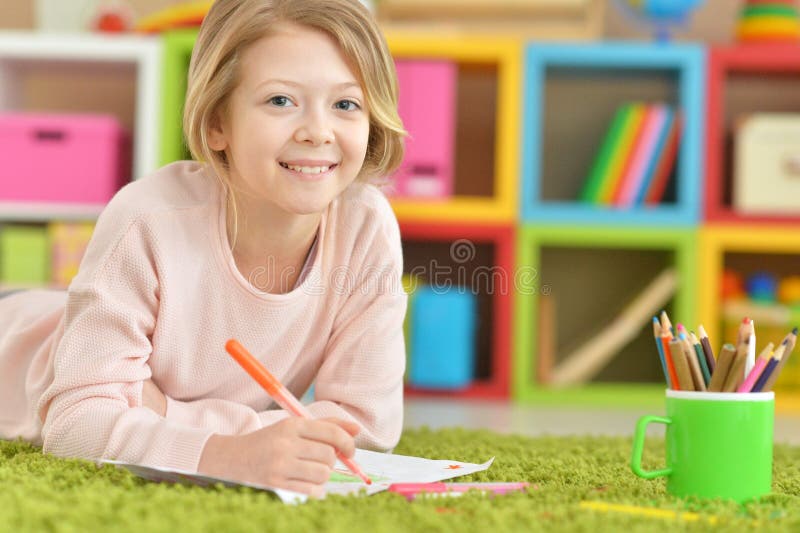 Girl drawing at home stock photo. Image of homework - 107748540