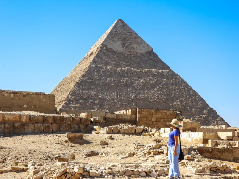 Girl Dressed in Blue with a Hat, Looking at the Pyramid Stock Image ...
