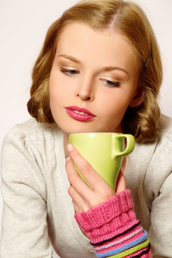 Girl drinking coffe or tea stock photo. Image of head - 11053704