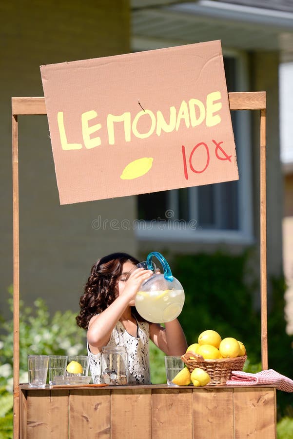Girl Drinking Lemonade from a Pitcher Stock Photo - Image of drink ...