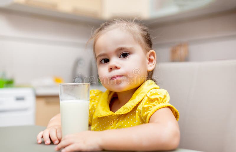 Girl Drinking Milk at the Kitchen Stock Photo - Image of caucasian ...