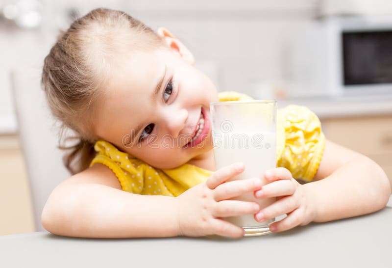 Girl Drinking Milk at the Kitchen Stock Photo - Image of beauty ...