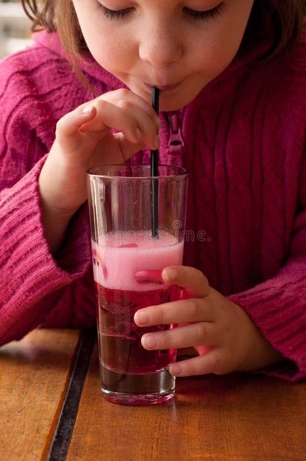 Girl Drinking Pink Lemonade Stock Image - Image of fizz, bubbles: 28426557