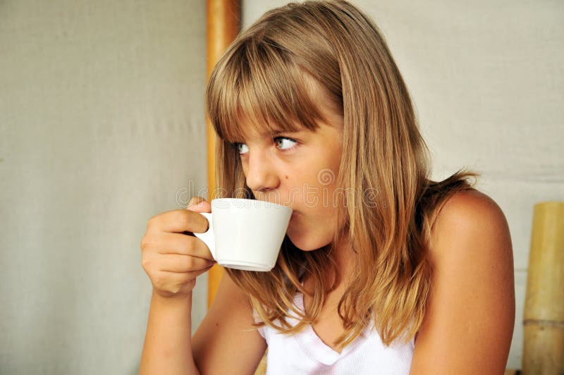 Girl drinking tea stock photo. Image of pretty, beauty - 16432850