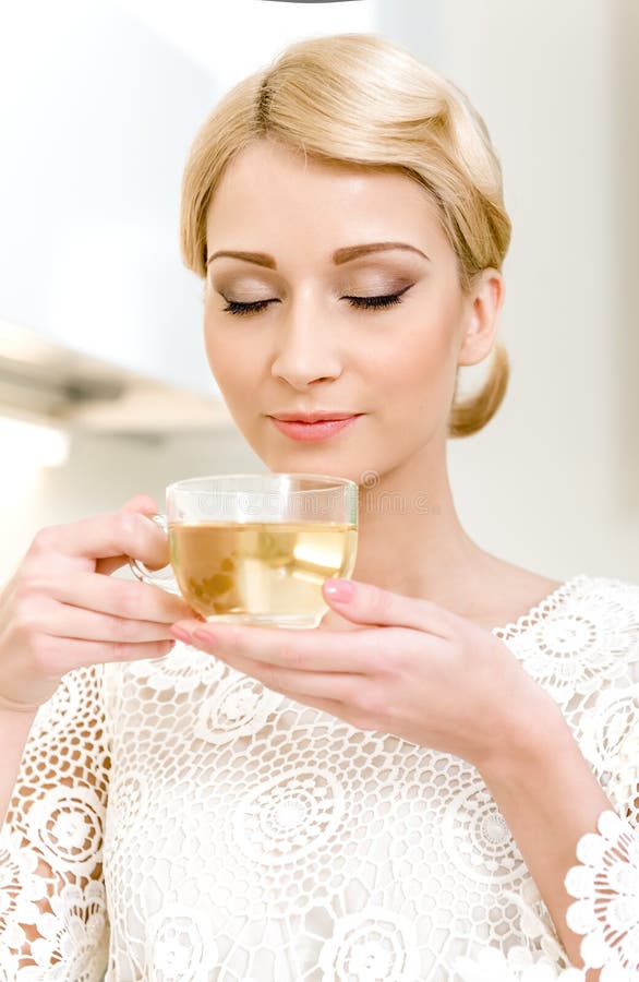 Girl drinking tea stock image. Image of face, freshness - 28814369