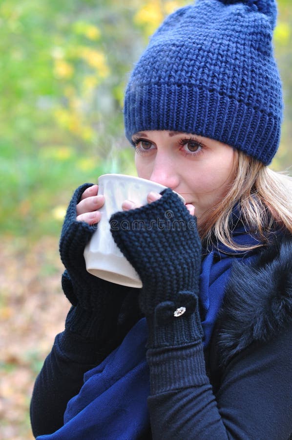 Girl Drinking Tea in the Cold Stock Photo - Image of sweater, enjoying ...