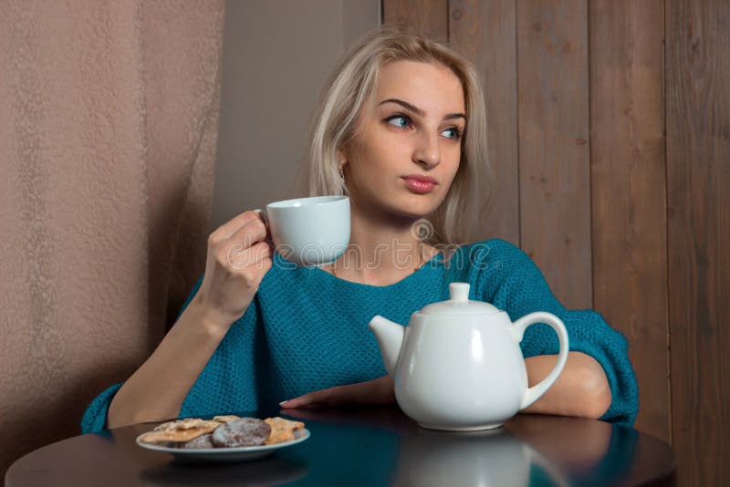 Girl drinking tea stock image. Image of attractive, adult - 72253665
