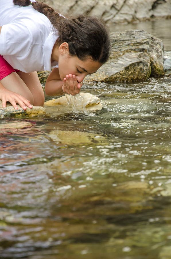 Girl Drinking Water stock photo. Image of rest, stream - 60238092