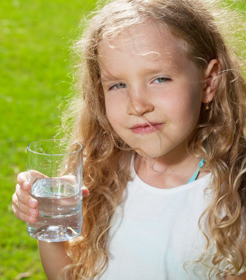 Girl Drinking Water Outdoors Stock Image - Image of heat, lifestyle ...