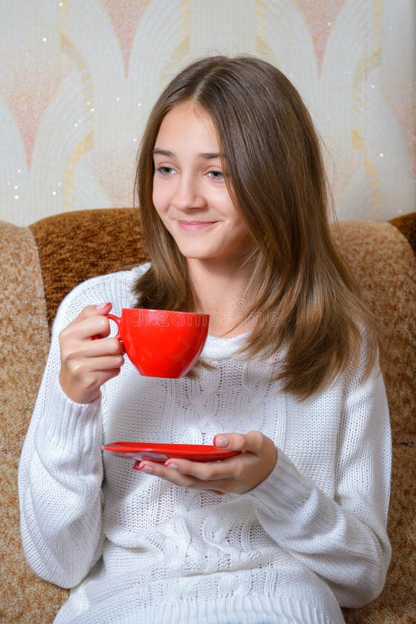 Girl drinks tea stock photo. Image of young, lifestyle - 64815822