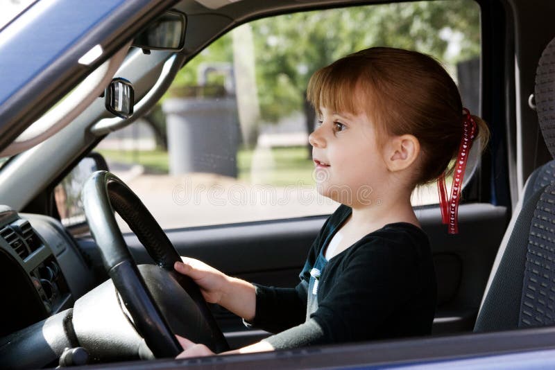 A girl driving a car stock photo. Image of black, honk - 5025492