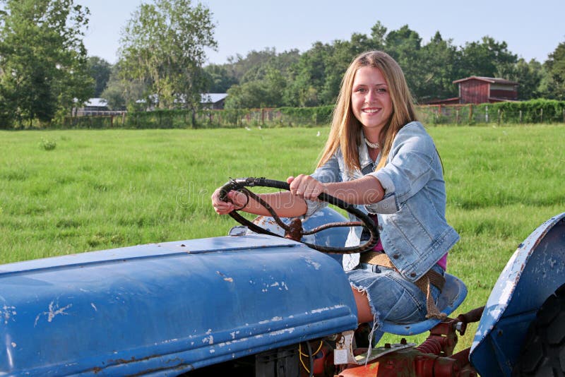 Girl Driving Tractor stock image. Image of rural, relax - 306357