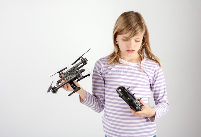 Girl with Drone and Remote Control Stock Photo - Image of flying ...