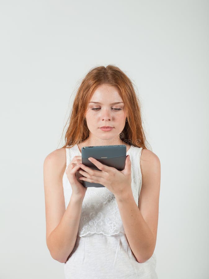 Girl with e-book stock photo. Image of education, reading - 20141124